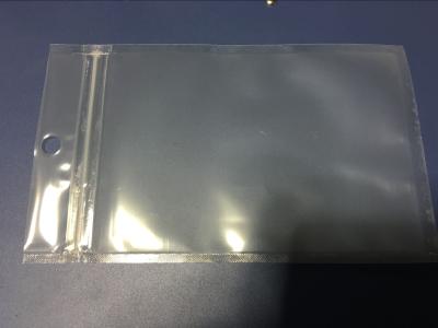 China Three Side Seal Clear Plastic Pouches Packaging k Bag With Hang Hole for sale