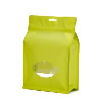 China Kraft paper tea packaging bags stand up aluminum plastic packaging bags with k for sale