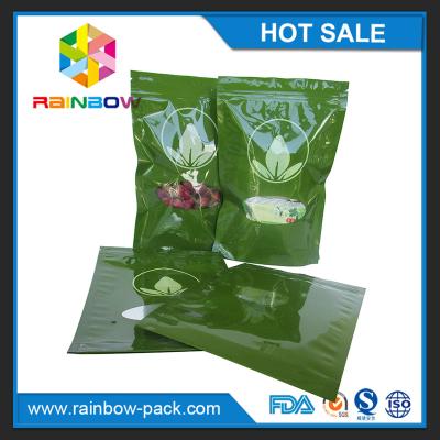 China Glossy Printing  Plastic Stand up Bag with clear window for tea Packaging with bottom gusset for sale