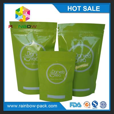China Aluminum foil Stand up customized logo Green printed  tea packaging bag with zipper and tear notches for sale