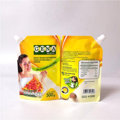 China Plastic Beverage Stand Up Pouches Reusable Fruit Juice Drink Spouted Bag With Cap for sale