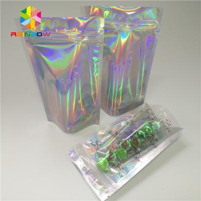 China Custom Plastic Mylar Resealable Stand Up Pouches Holographic Cosmetics Packaging for sale