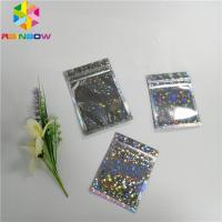 China Transparent Front Foil Packaging Bags Holographic Smell Proof Heat Seal Recyclable for sale