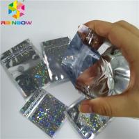 China Transparent Front Foil Packaging Bags Holographic Smell Proof Heat Seal Recyclable for sale