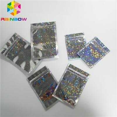 China Hologram Foil Pouch Packaging Heat Seal Star Flash Mylar Plastic Three Side Seal Zipper Bag for sale