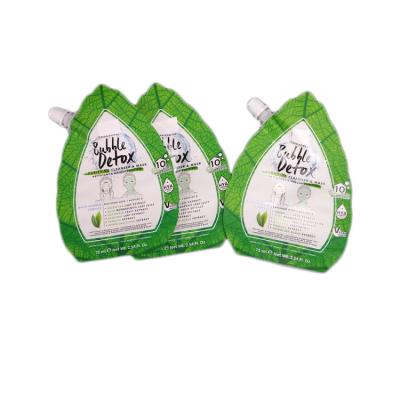 China Custom Printed Design Green Irregular Spout Pouch Packaging With Foil for sale