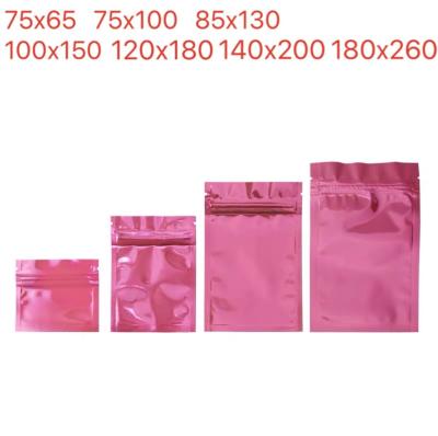China Cosmetic Product Skin Care Cream Packaging Small Sachet Current Size Flat Transparent Shinny Bag Pink Red Rainbow Bag for sale