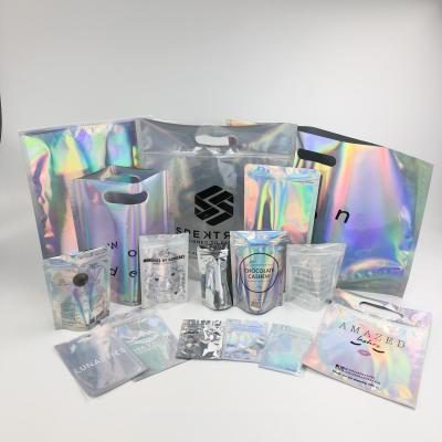 China Foil Laminated CMYK Holographic Laser Bags Garment Packaging for sale