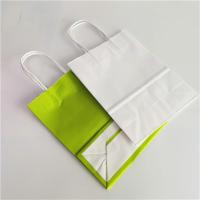 China Kraft Paper CMYK 350gsm cardboard Grocery Shopping Bags With Handle for sale