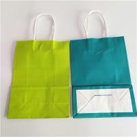 China Kraft Paper CMYK 350gsm cardboard Grocery Shopping Bags With Handle for sale