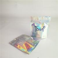 China Custom Accepted Holographic Cosmetics Packaging Bags with Zipper for sale