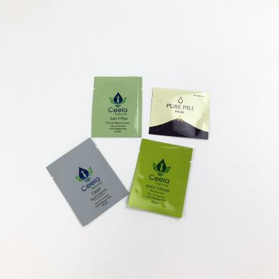 China Wholesale grip seal glossy mylar foil sample pouch bags for skin care/powder/capsules packaging for sale