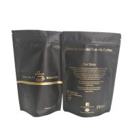 China Matte Black Finish Foil Stand Up Zipper Packaging Bag Coffee Bag With Gold Strips for sale