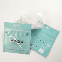 China Low MOQ clear front dental floss hang hole plastic packaging bags aluminum foil zipper bag packaging for sale