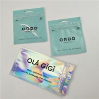 China Low MOQ clear front dental floss hang hole plastic packaging bags aluminum foil zipper bag packaging for sale