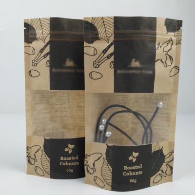 China Snack Waterproof Stand Up Laminated Brown Kraft Paper  Bags With Window for sale