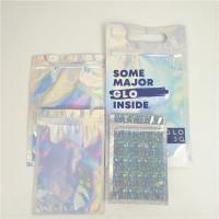 China Glossy UV CMYK Zipper Holographic Bags MOPP Plastic Food Packaging Bag for sale
