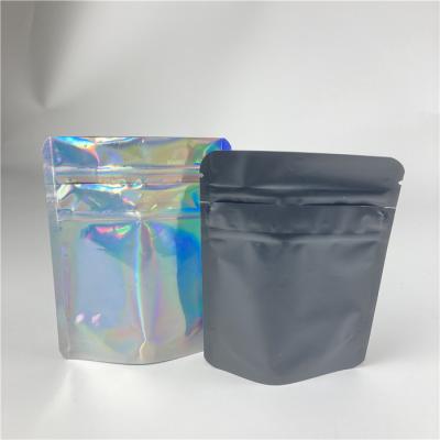 China Hologram Plastic Pouches Packaging Stand Up Zipper Bag Childproof for sale