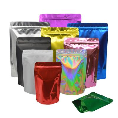 China Smell Proof Resealable Transparent Holographic Mylar Zip Lock Bags For Candy Packaging for sale
