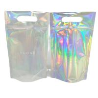 China Transparent Plastic Holographic Bags Cosmetic Aluminum Foil Mylar Bags With Zipper Handle for sale