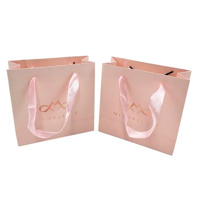 China Custom Print Logo Elegant White Black Gift Paper Bags Luxury Clothing Boutique Paper Shopping Bag With Ribbon Handle for sale