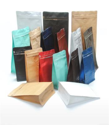 China Printed Kraft Paper Packaging Bags Flat Bottom Coffee Pouches With Degassing Valve for sale