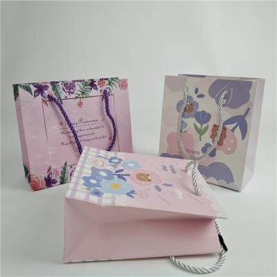 China Promotional Quality Assurance Custom Digital Printing Logo Printed Shopping Paper Bag Packaging for sale