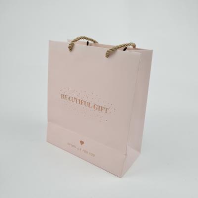 China Quality Assurance Customized Paper Bags for Shopping with Logo Printing Biodegradable Paper Pouch for sale