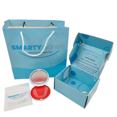 China Custom Orthodontic Teeth Aligners Packaging Boxes Braces Dental Denture Aligner Box With Paper Bag for sale