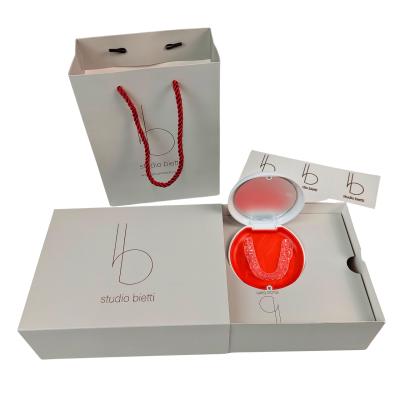 China Custom Logo Print Dental Aligner Box with Magnetic Closure and 350g Thickness for Orthodontic Packaging for sale