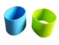 China Heat Resistant Plastic Cup Sleeve Colorful Plastic Coffee Cup Holders for sale