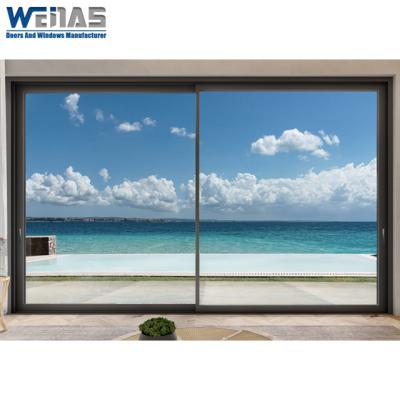 China Thermal Break Profile External Aluminium Sliding Doors With Low-E Insulation Glass for sale
