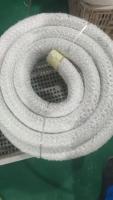 China 1260 Ceramic Fiber Round Rope with glass fiber &  Stainless Steel Wire Mesh Reinforced Ceramci Fiber Rope for sale