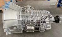 China Manual Transmission Gearbox Assembly for JMC ISUZU VAN Cargo Truck 2.4L Diesel Engine for sale