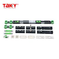 China Sliding Wardrobe Wheel Hardware Long Life Double Soft Closing Door Pulley Damper Rollers for sale