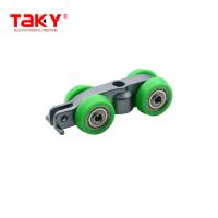 China Sliding Wardrobe Wheel Hardware Long Life Double Soft Closing Door Pulley Damper Rollers for sale