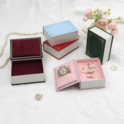 China Luxury Square Paper Jewelry Box Rectangle Book Shape Custom Embossed Jewelry Boxes for sale