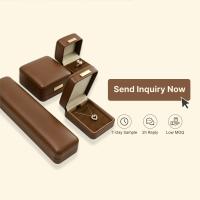 China Luxury Brown PU Faux Leather Jewelry Organizer With Engraved Design for sale