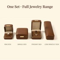 China Luxury Brown PU Faux Leather Jewelry Organizer With Engraved Design for sale