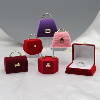 China Beautiful Velvet Engagement Ring Box Custom Color Options Flocking Jewelry Box for sale