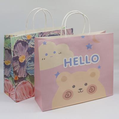 China Custom Printed Kraft Paper Bags Sturdy  Gift Packaging Bag For Shoes Clothing Shopping for sale