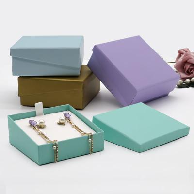 China Custom Logo High End Cardboard Jewelry Box UV Printing Paper Bangle Box for sale