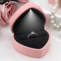 China Custom Logo Pink Plastic LED Light Jewelry Box Fashion Led Bracelet Box Heart Shape for sale