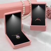 China Custom Logo Pink Plastic LED Light Jewelry Box Fashion Led Bracelet Box Heart Shape for sale