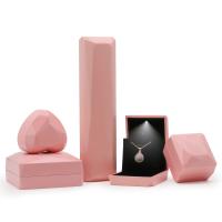 China Custom Logo Pink Plastic LED Light Jewelry Box Fashion Led Bracelet Box Heart Shape for sale