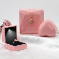 China Custom Logo Pink Plastic LED Light Jewelry Box Fashion Led Bracelet Box Heart Shape for sale