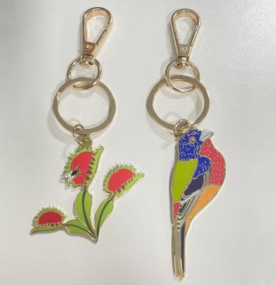 China Custom Key Chain with 3D Logo Letters Hard Soft Enamel and Sandblast Backside Personalized Keychain for sale