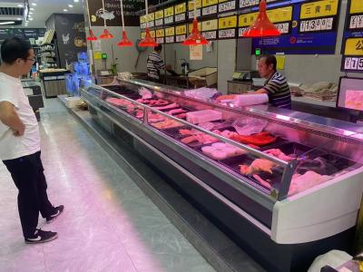China Adjustable Glass Shelves Meat Display Refrigerator Offering Temperature Range -2°C To 8°C and Forced Air Cooling System for Meat Storage for sale