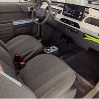 China s Geely EV Mini Solar Car with 4 Seats Euro II Emission Standard and 360° Rear Camera for sale