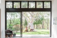 China Customized Size Patio Sliding Doors Double Glazed 5mm+12A+5mm Aluminum Frame for sale